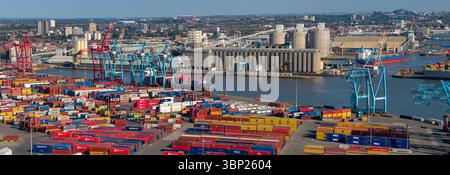 Aerial image of the Liverpool port facility with large cranes and ...