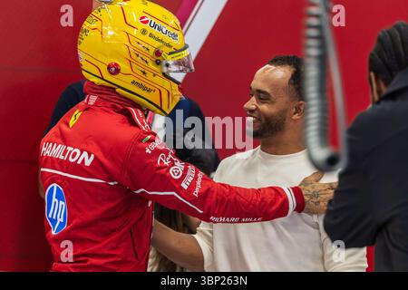 Ferrari driver Lewis Hamilton of the United Kingdom arrives to the ...