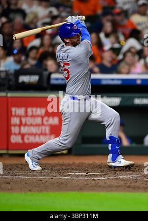 Chicago Cubs' Carson Kelly (15) scores on a sacrifice fly by Ian Happ ...