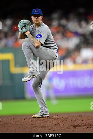 Chicago Cubs starting pitcher Cade Horton throws to the plate against ...