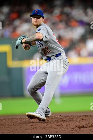 Chicago Cubs starting pitcher Cade Horton throws to the plate against ...