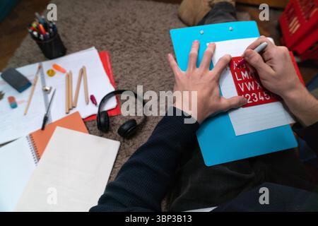 Student preparing for university exams at home Stock Photo - Alamy