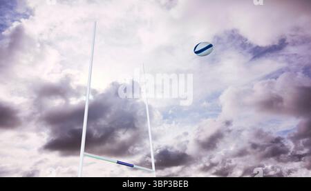 Rugby ball flying between posts Stock Photo - Alamy