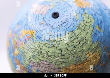 Puzzle globe. Map made from puzzle pieces. Russia Stock Photo - Alamy