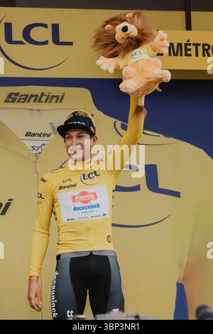 Jasper Philipson receives the yellow jersey after winning Stage One of ...