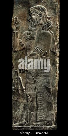 Figure holding a poppy flower Neo Assyrian palace of Sargon II 721-705 ...