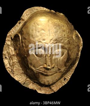 A photograph of the "Mask of Agamemnon", a gold male death-mask made of ...