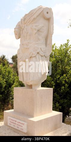A photograph of a headless statue, statue from the Temple of Hephaistos ...