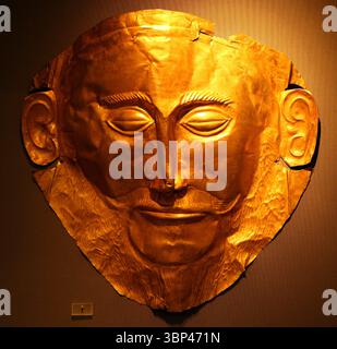 The Mask of Agamemnon is a gold funerary mask discovered at the Bronze ...