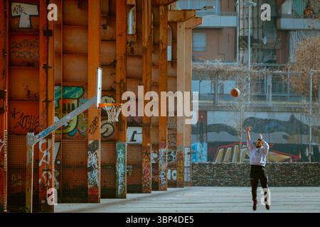 Basketball street player at the Parco Dora Stock Photo - Alamy