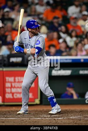Chicago Cubs' Carson Kelly (15) is high-fived after scoring during a ...