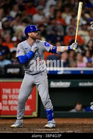 Chicago Cubs' Carson Kelly (15) is high-fived after scoring during a ...