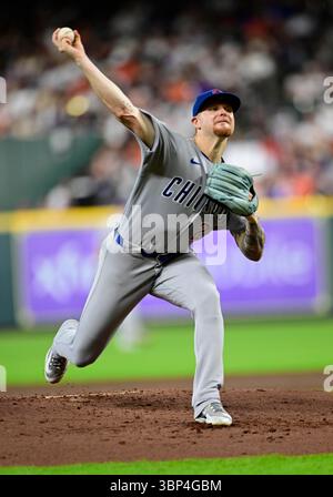 Chicago Cubs starting pitcher Cade Horton throws to the plate against ...