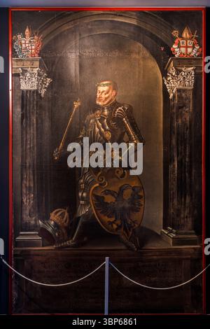 A rope in oil lies on a plate and burns, and next to it lies a light ...