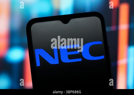 In this photo illustration, the NEC Corporation company logo is seen ...