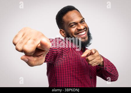 Hey. Cheerful Black Man Shouting Holding Hands Near Mouth Looking At ...