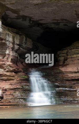 A closeup shot of a beautiful waterfall flowing in the forest Stock ...