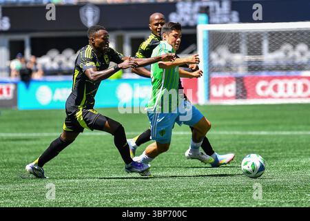 Seattle Sounders FC midfielder Kalani Kossa-Rienzi (85) enters the ...