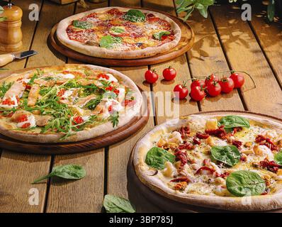 Food, Artisanal pizzas with fresh toppings top view, rustic setting ...