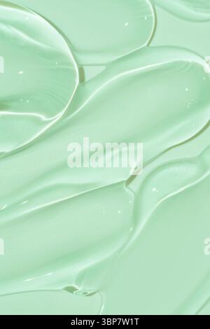 Smears and texture of cosmetic green cream isolated on white background ...