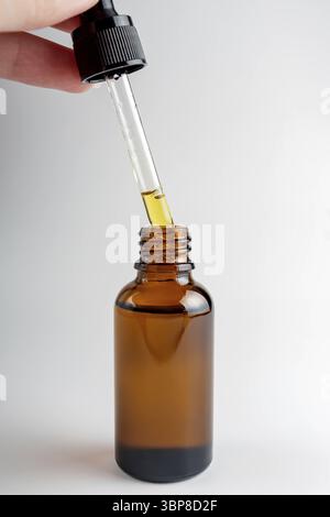 Natural skin care product. Open jar of moisturizing cream on green ...