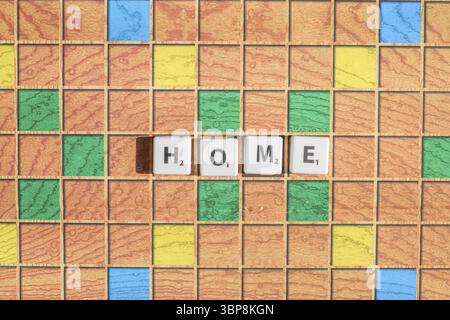 Moscow, Russia - April 09, 2020: Scrabble game letters. Word home on ...
