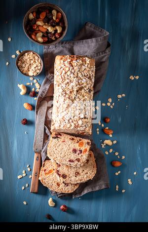 Homemade delicacies bread with bran, raisins and nuts. Bread with ...
