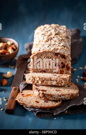 Homemade delicacies bread with bran, raisins and nuts. Bread with ...