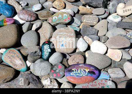 Love stone messages near the ancient church of St Tanwg situated in the ...
