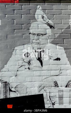 mural/artwork of colonel sanders on the side of a kfc fast food outlet ...