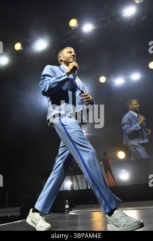 LONDON, ENGLAND - APRIL 12: Macklemore (Benjamin Haggerty) performing ...