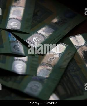 Augsburg, Germany. 03rd June, 2025. Euro banknotes in a transparent ...