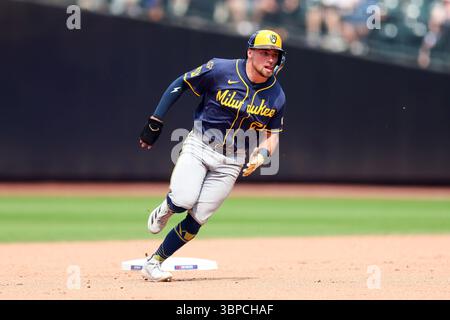 Milwaukee Brewers' Caleb Durbin (21) celebrates with teammates after ...