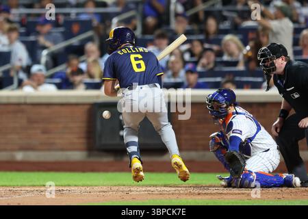 Milwaukee Brewers' Isaac Collins at bat against the St. Louis Cardinals ...
