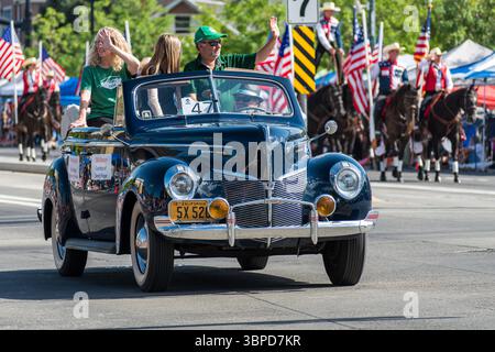 Spectators wave at parade participants during the Israel Day Parade ...