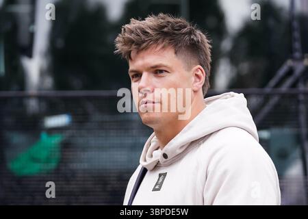 Huw Jones of the British & Irish Lions attempts to break the tackle of ...