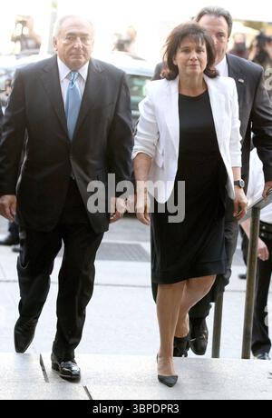 Dominique Strauss-Kahn and his wife Anne Sinclair flanked by Anne ...