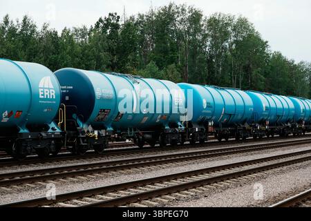 Cargo trains with tank cars are seen at a train staiton near Mockava ...