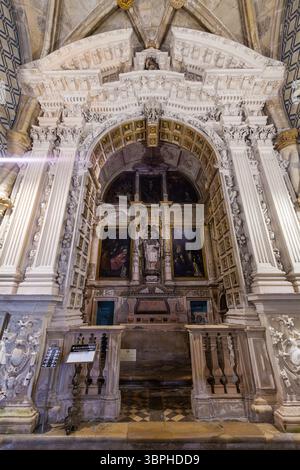 A grand, intricately carved stone altar with elaborate architectural ...