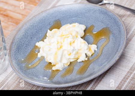 Catalan cheese mato from goat milk with honey Stock Photo - Alamy