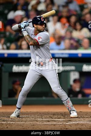 Cleveland Guardians' Brayan Rocchio, left, tags out Seattle Mariners ...