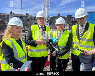 Ray McAdam, Lord Mayor of Dublin, center, speaks with Henry Hodgson ...
