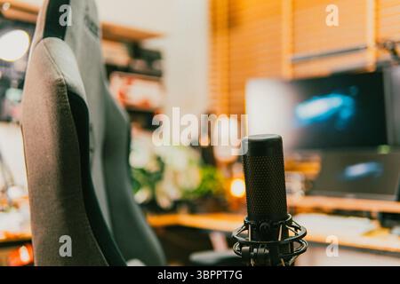 Modern cinematic desk setup with triple monitor, gaming chair, ambient ...