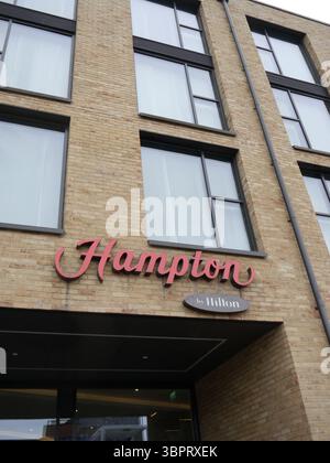 Hampton Inn by Hilton Corporate logo signs in York City centre in June ...