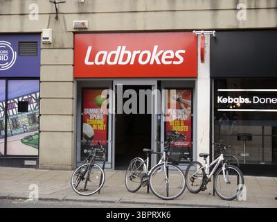 Ladbrokes betting shop Corporate logo signs in York City centre in June ...