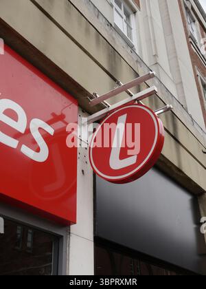 Ladbrokes betting shop Corporate logo signs in York City centre in June ...