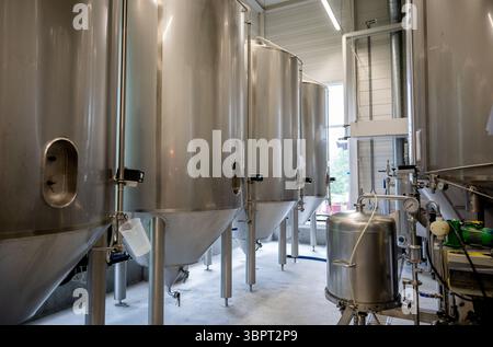Stainless steel brewing tank inside modern craft brewery facility Stock ...