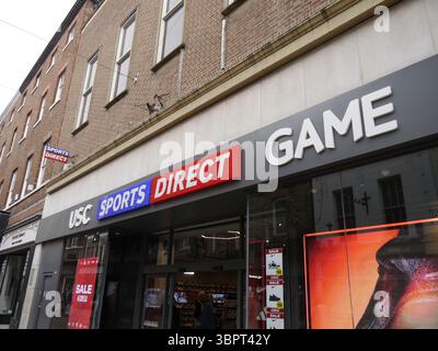 sports direct game, USC, Corporate logo signs in York City centre in ...