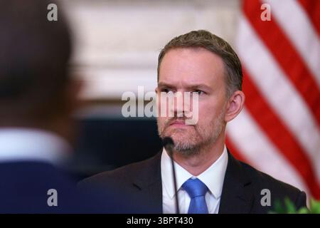 U.S. Trade Representative Jamieson Greer is seen with members of his ...