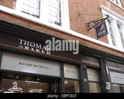 Thomas the Baker Corporate logo signs in York City centre in June 2025 ...